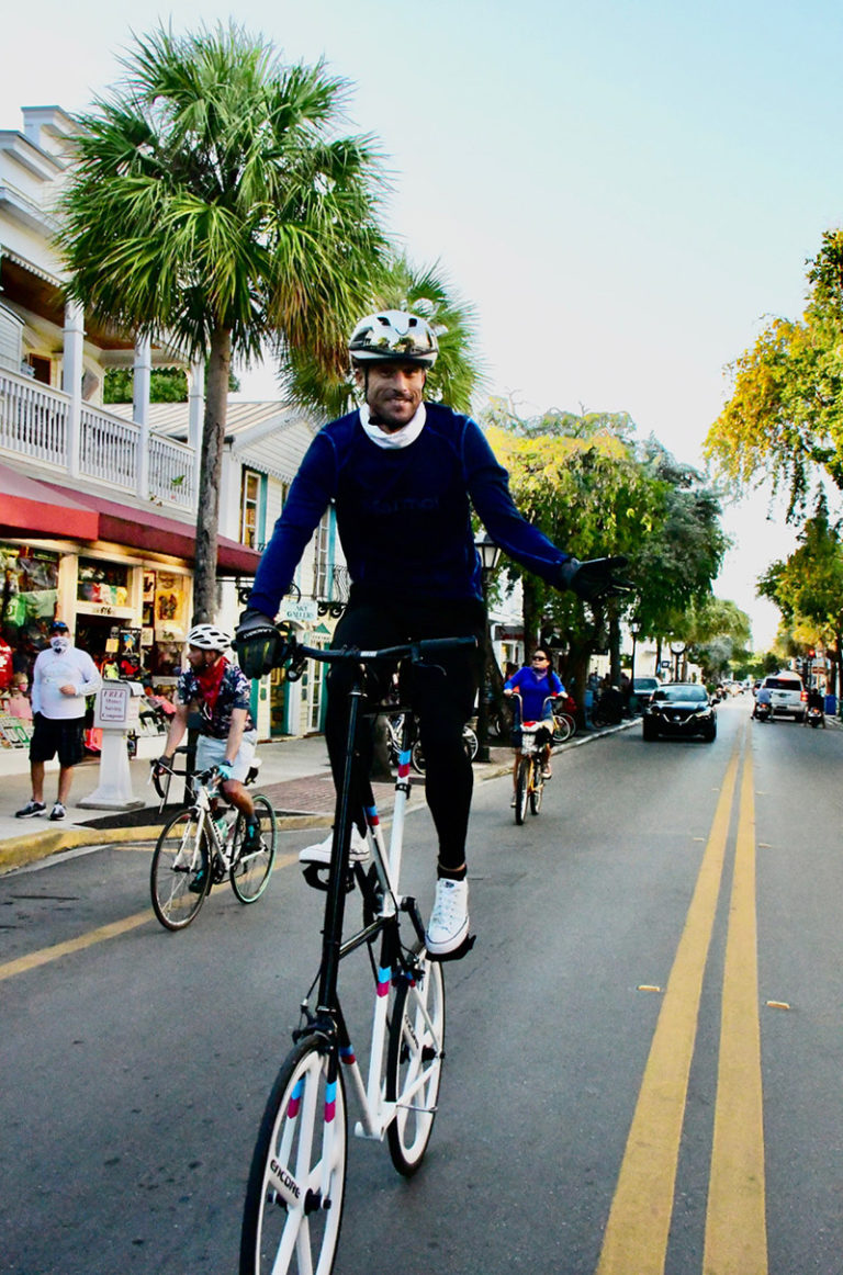 TALL BIKER PEDALS TO KEY WEST WHILE DRAWING ATTENTION ON U.S. 1