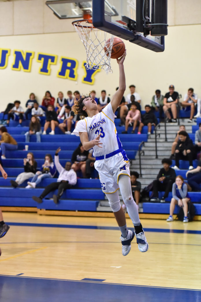 IN PICTURES: MARATHON JV BASKETBALL DOWNS COLONIAL CHRISTIAN