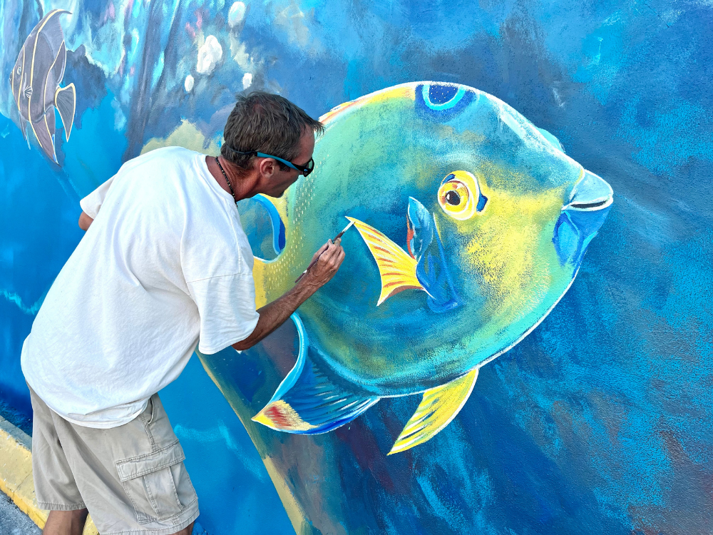 ARTIST YOSLAN O’FARRILL REDESIGNS MARATHON VET HOSPITAL MURAL