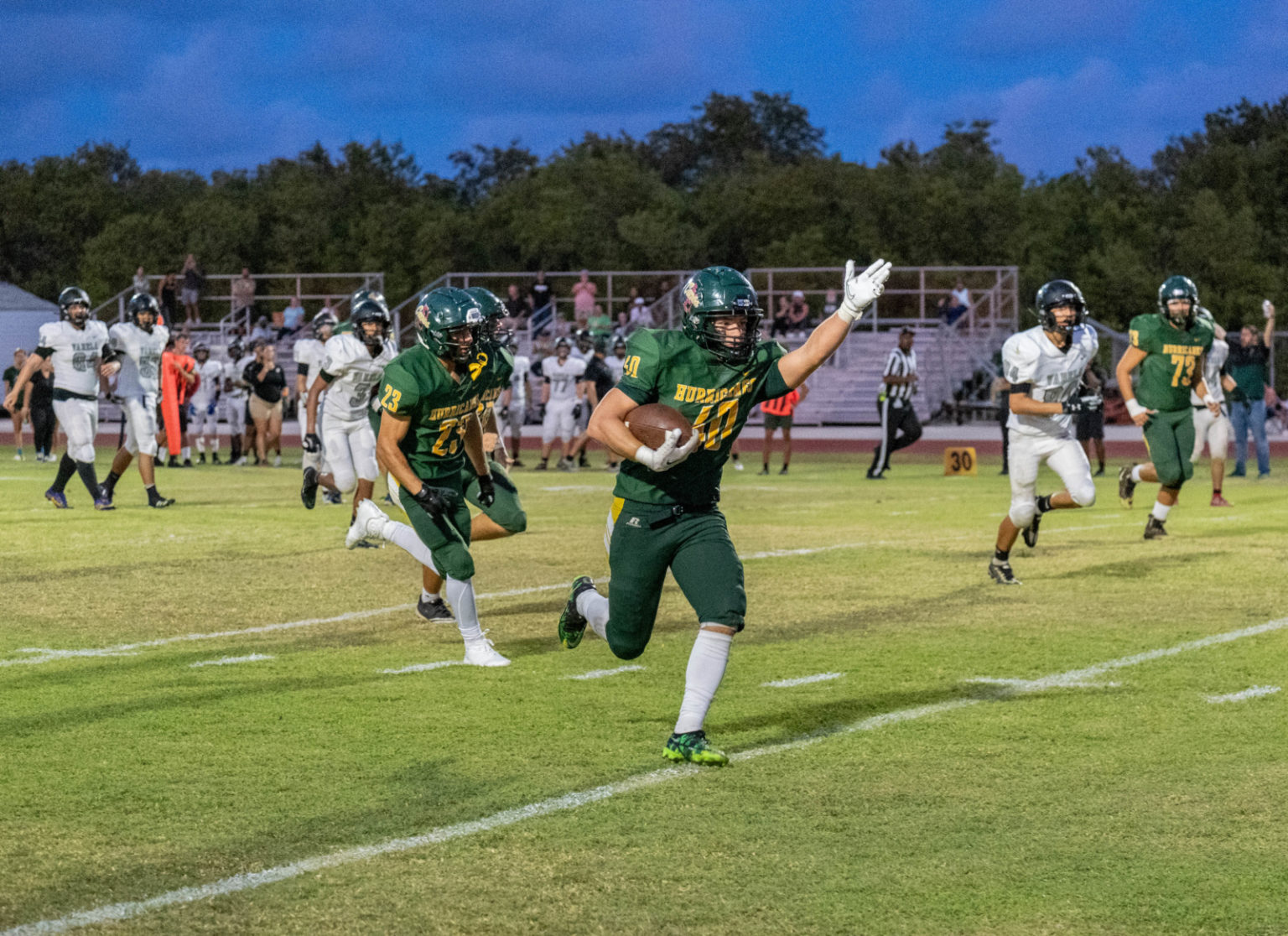 IN PICTURES: ’CANES ROLL PAST RAMS IN FOOTBALL SEASON OPENER