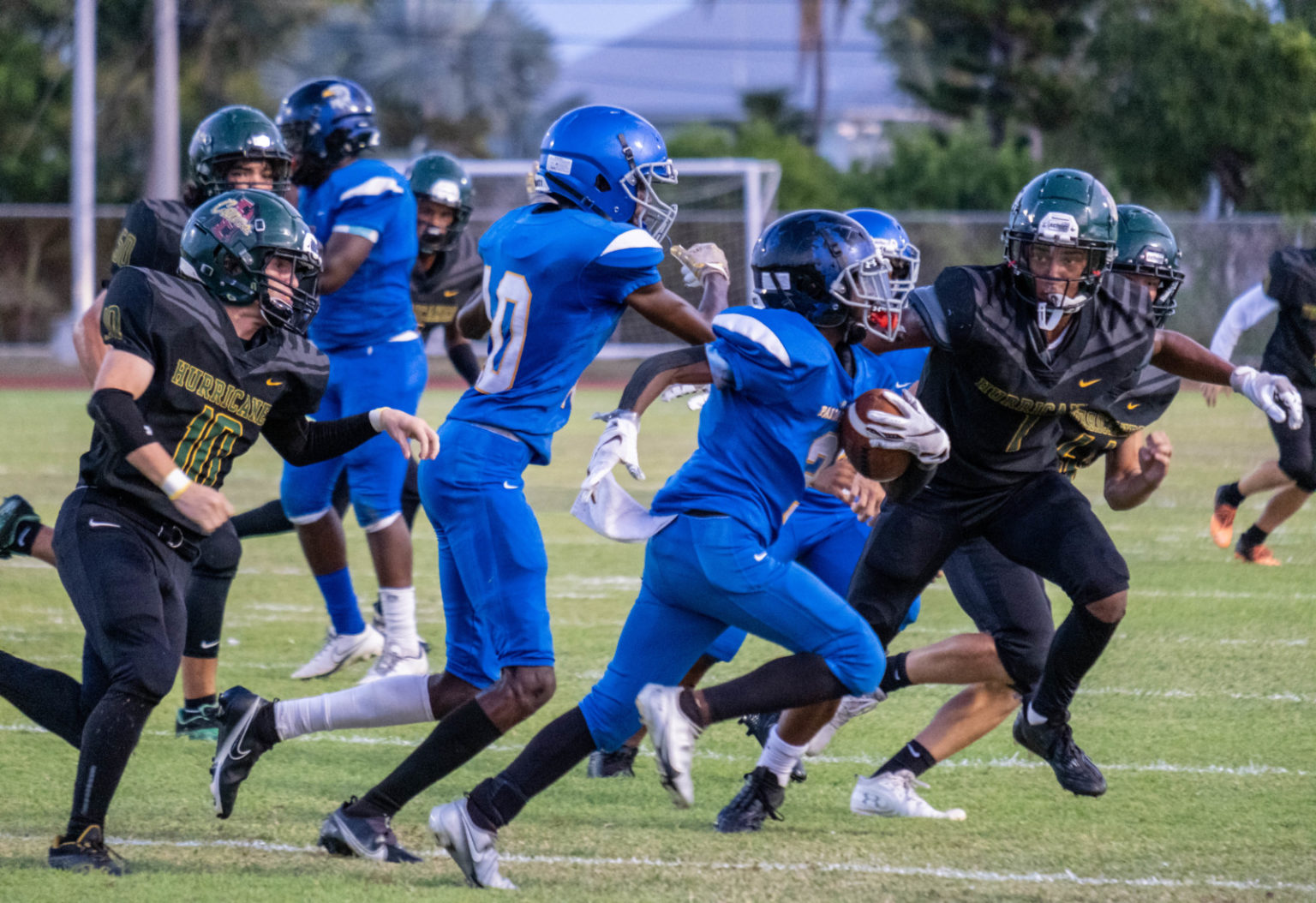 IN PICTURES: ’CANES VARSITY FOOTBALL CLOBBERS PALM GLADES