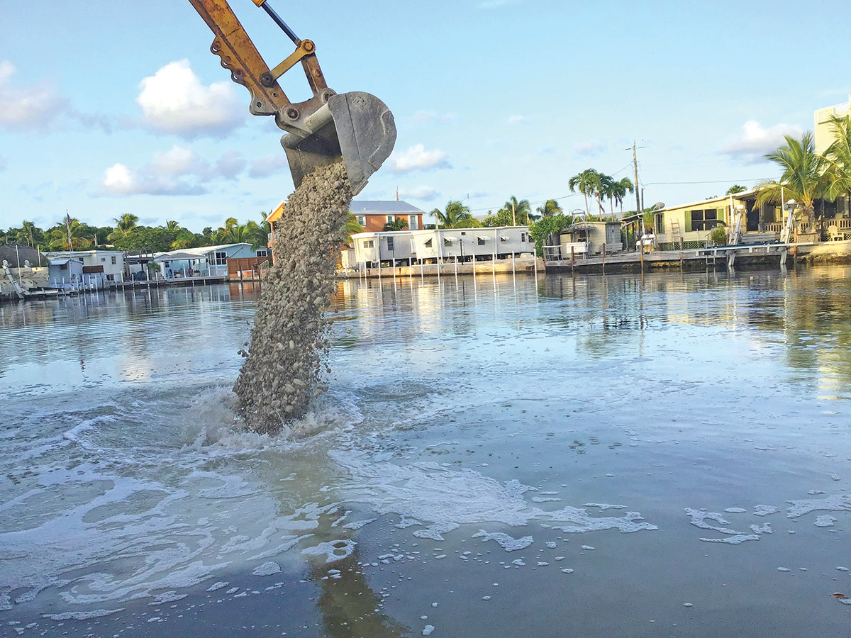 CANAL RESTORATIONS UNDERWAY IN KEY LARGO, FLORIDA