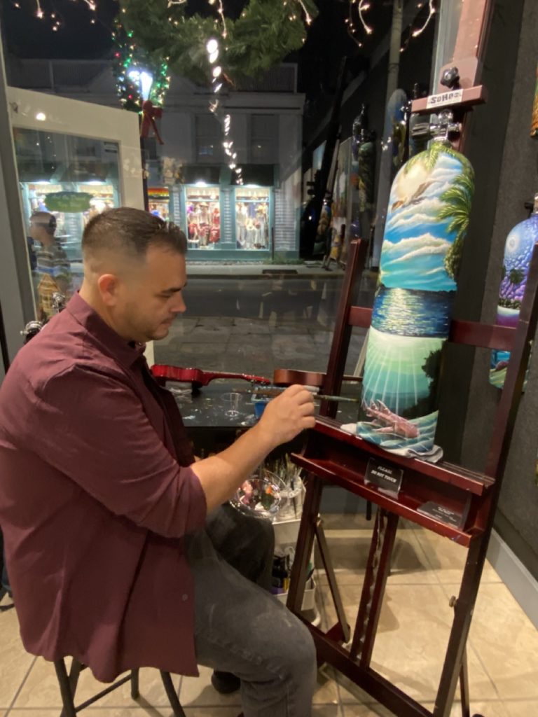 KEY WEST ARTIST TURNS OLD SCUBA TANKS INTO ORIGINAL PAINTINGS