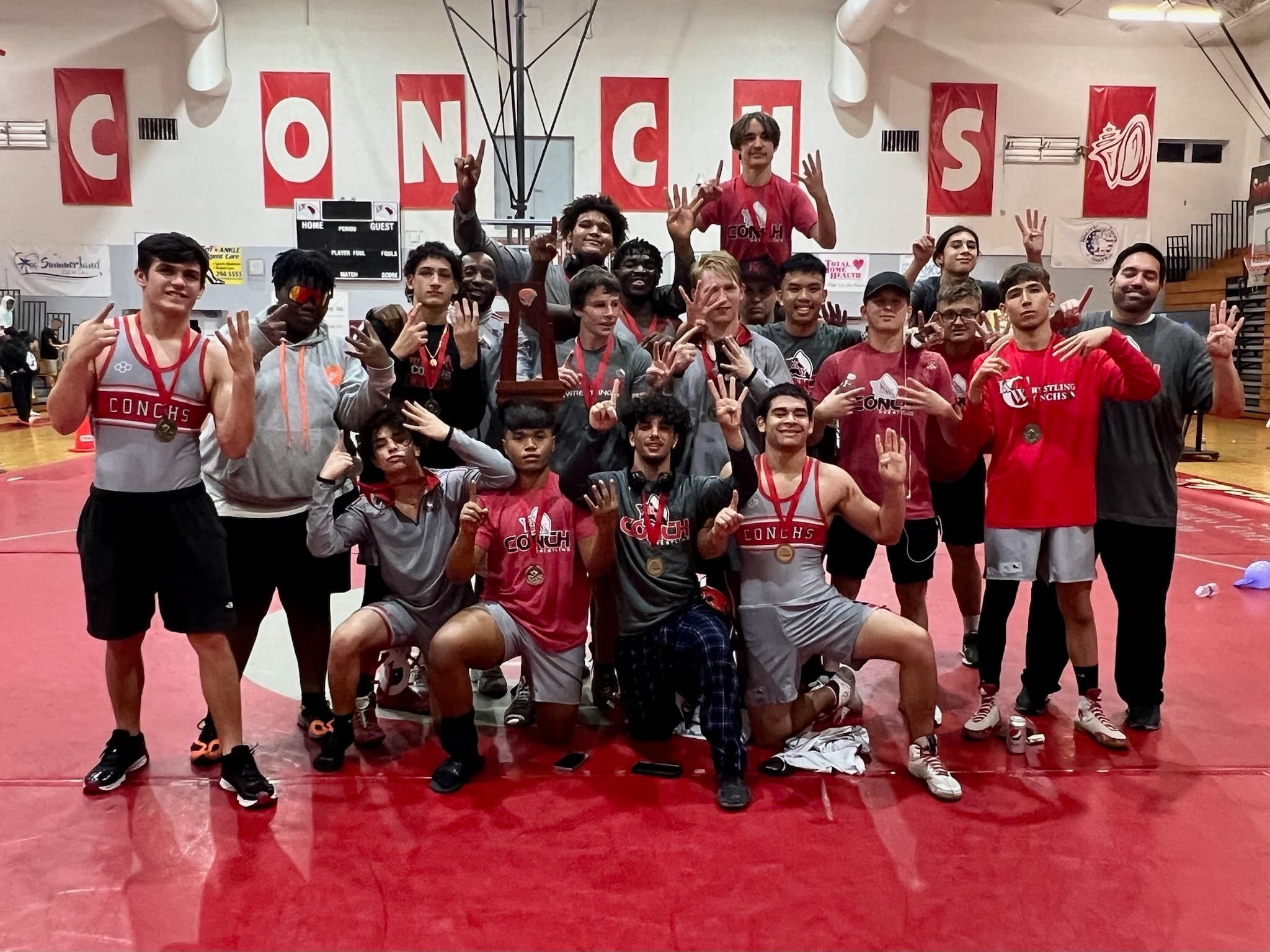 WRESTLING: CONCHS SECURE 14TH DISTRICT TITLE; LADY CONCHS SEND 3 TO ...