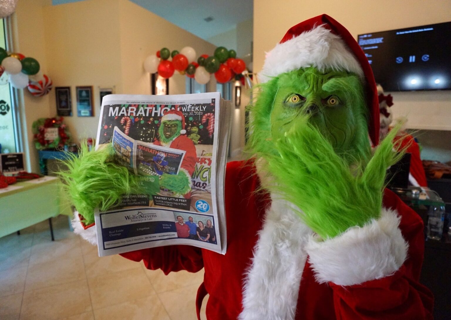 MERRY GRINCHMAS: DR. SEUSS ICON VISITS BERKSHIRE HATHAWAY