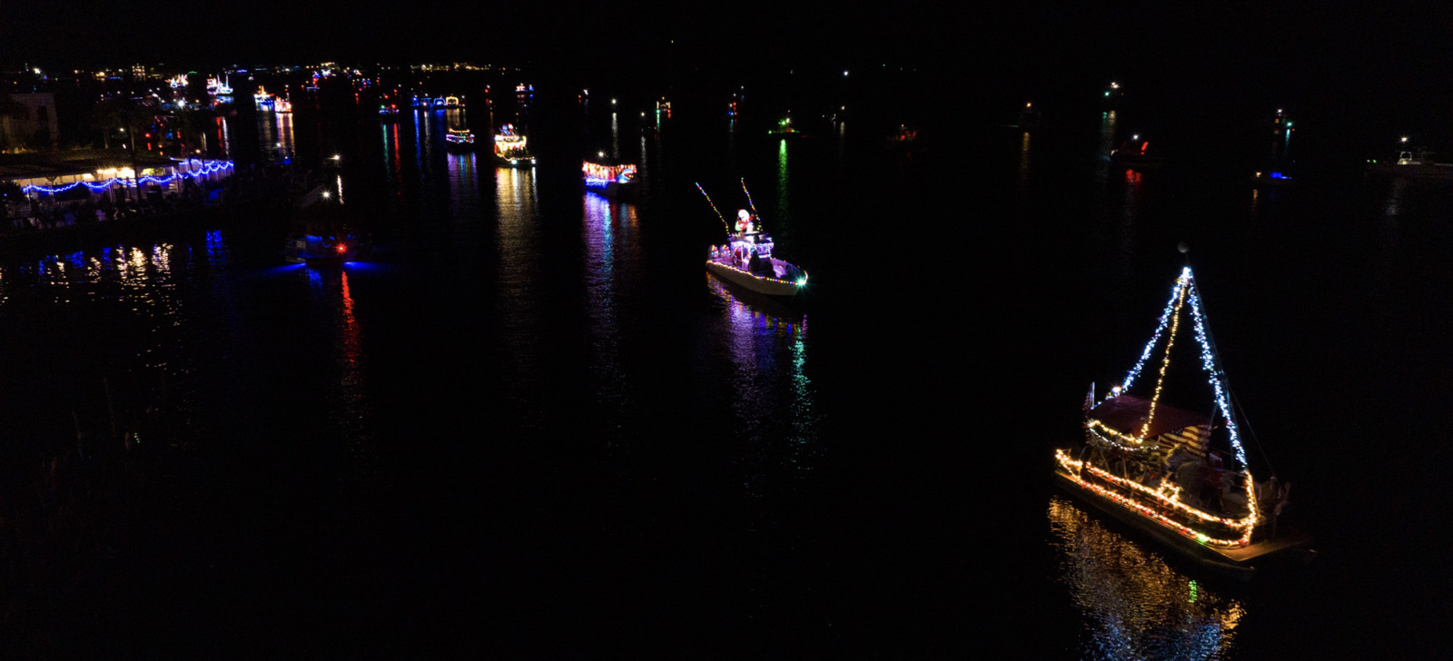IN PICTURES: LIGHTED VESSELS & FIREWORKS ILLUMINATE FLORIDA BAY DURING ...