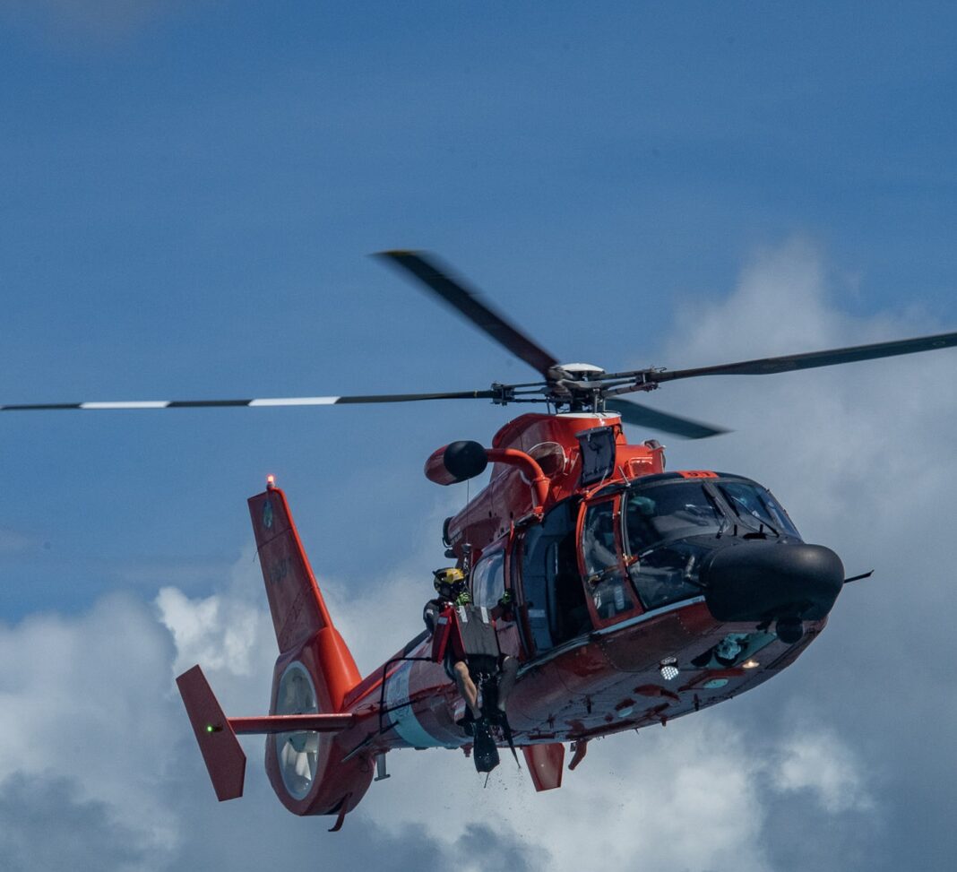 COAST GUARD RESCUES TWO PEOPLE AFTER THEIR KAYAK OVERTURNED OFF KEY LARGO